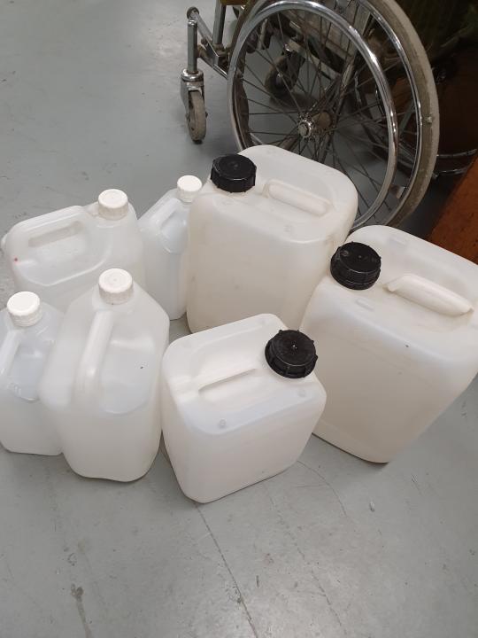 7 large chemical containers | FILM MEDICAL