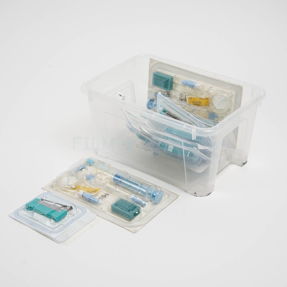 Clear Container Dressed Syringe In Packet | FILM MEDICAL