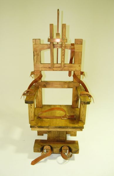 Wooden electric chair with leather restraining straps | FILM MEDICAL